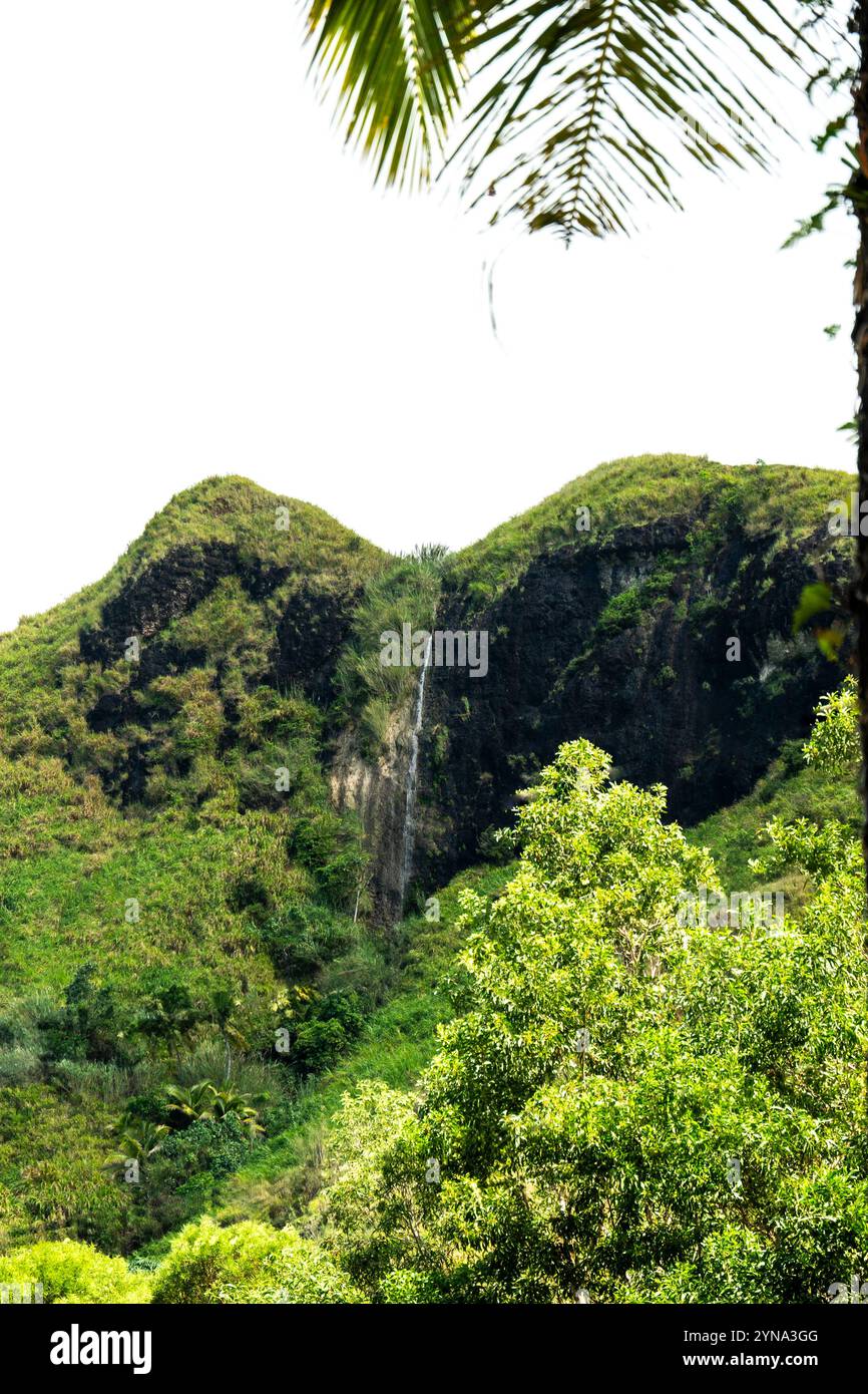 Discovering a hidden waterfall during a Guam road trip adventure Stock ...