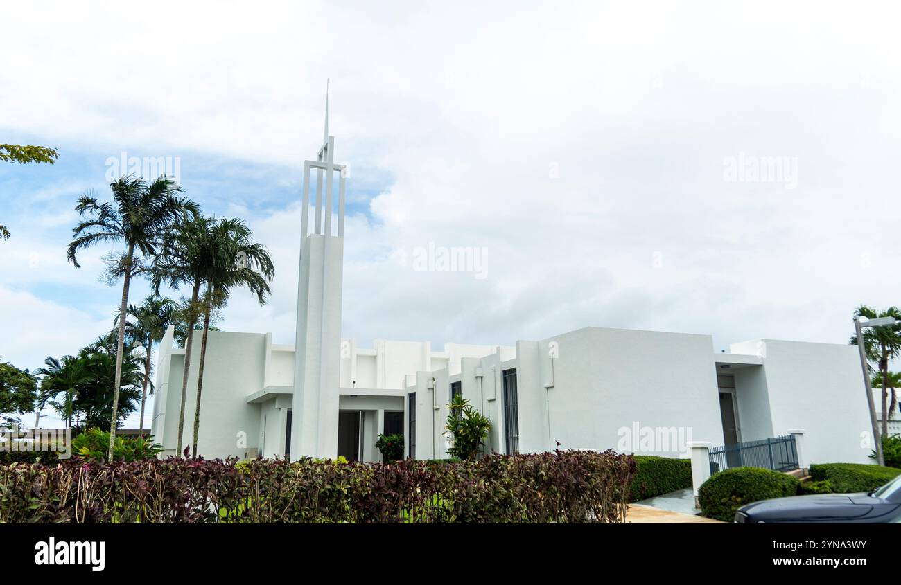 Modern architectural design of a white building with a spire in ...