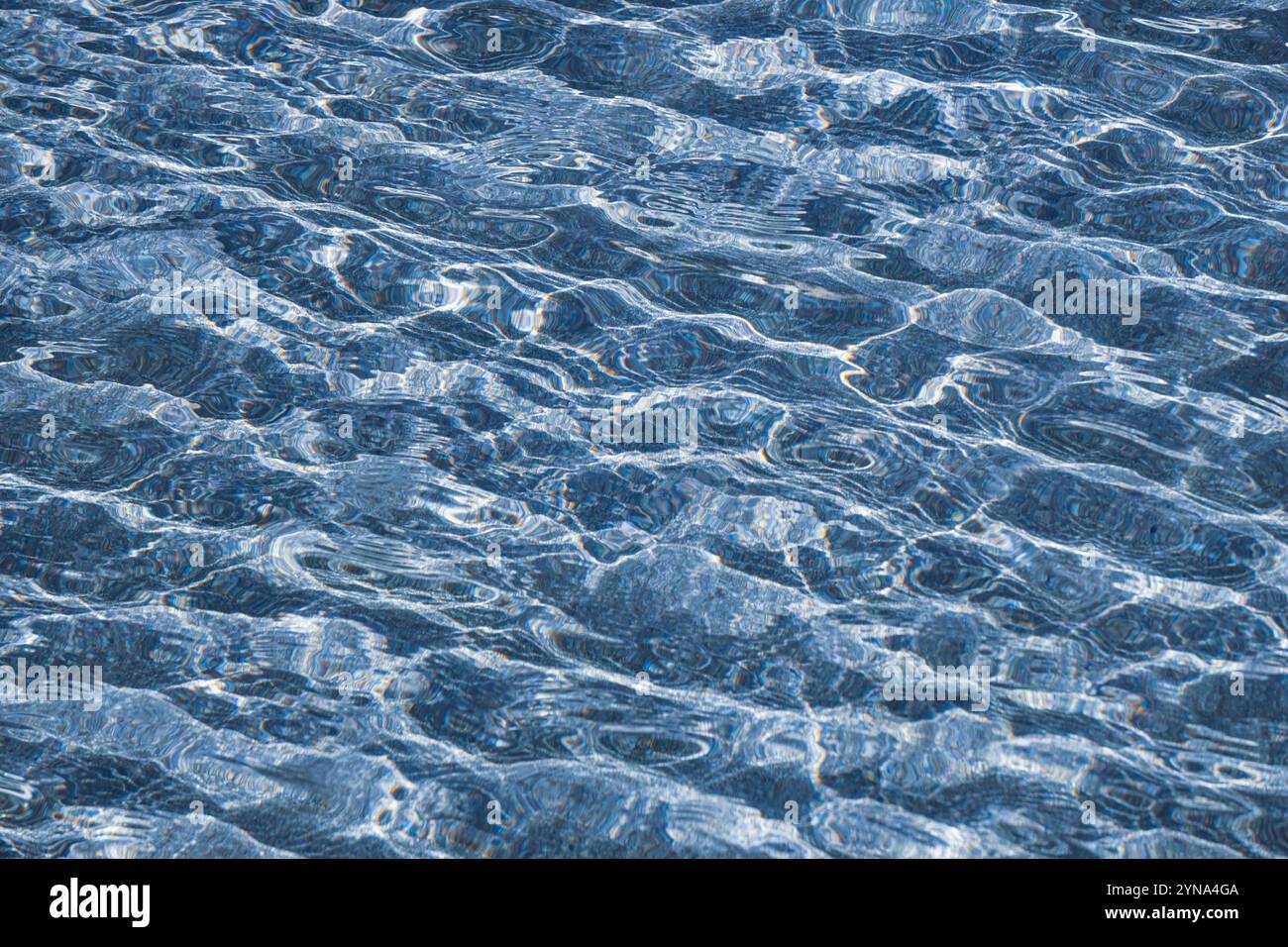 refelction an ripples on the water in the pool, color background Stock ...