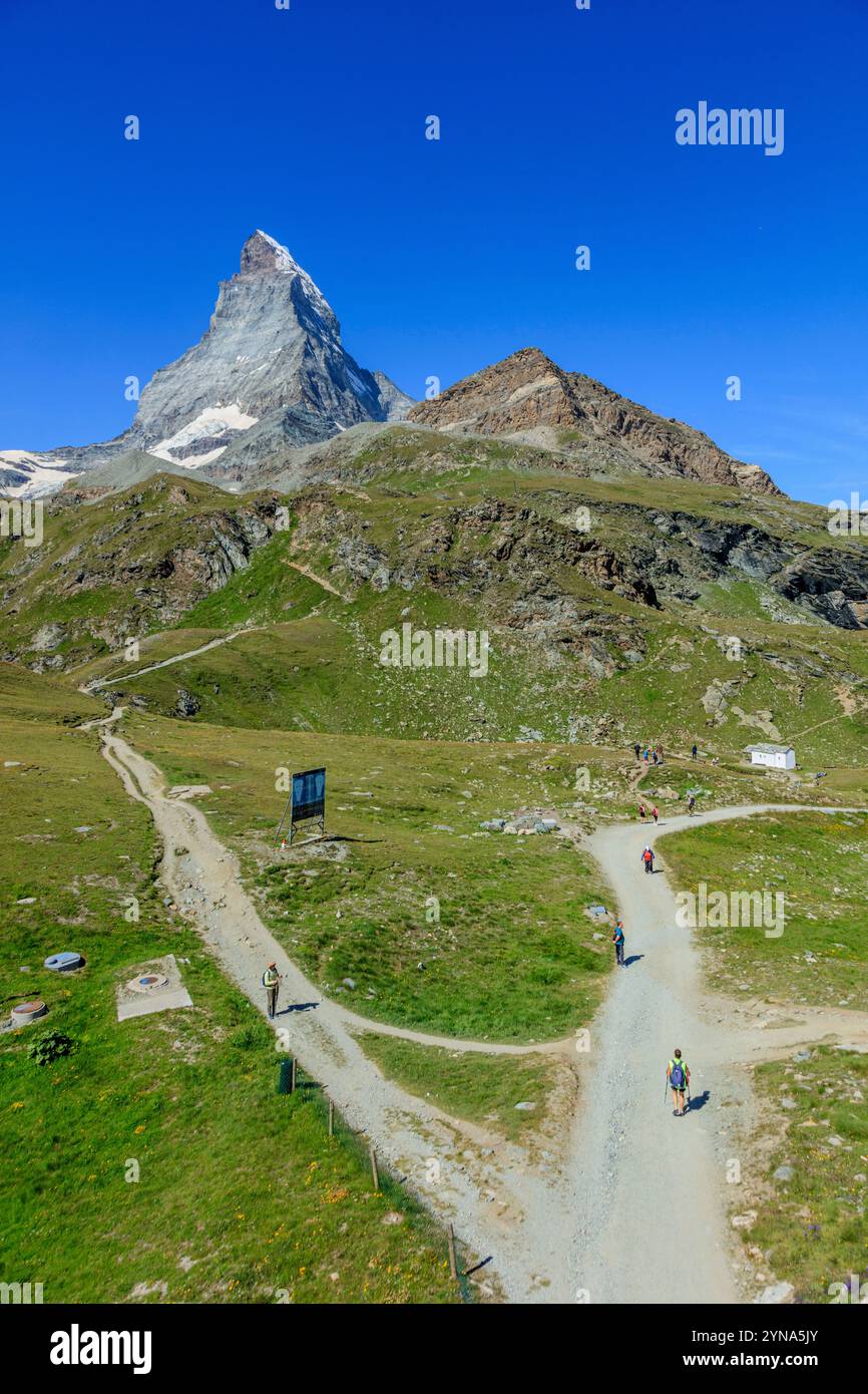 Switzerland, Canton of Valais, Zermatt, Schwarzsee, hikers and the ...