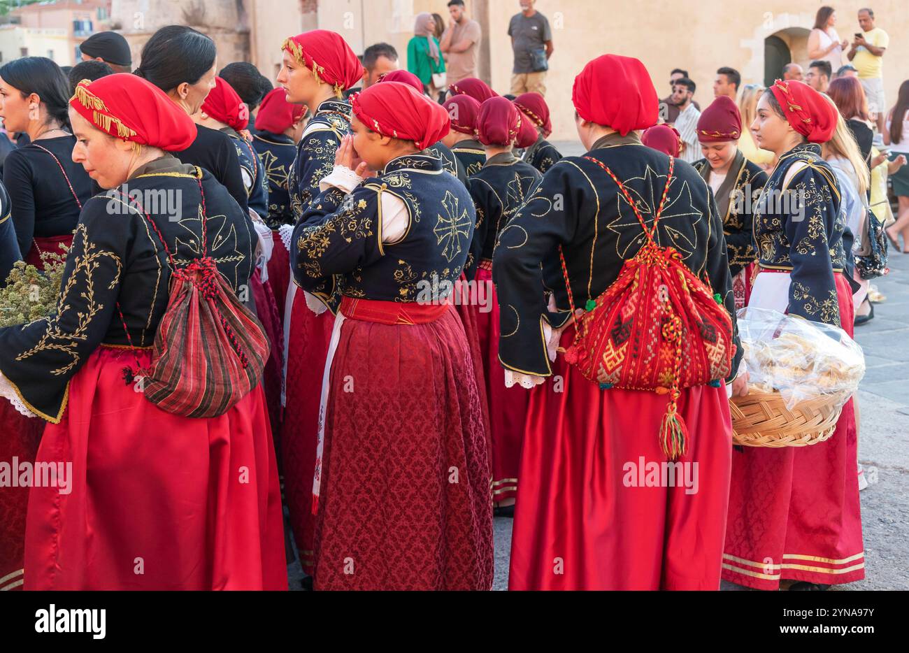 Greece, Crete, Traditionally dressed Greek women carrying gifts during ...