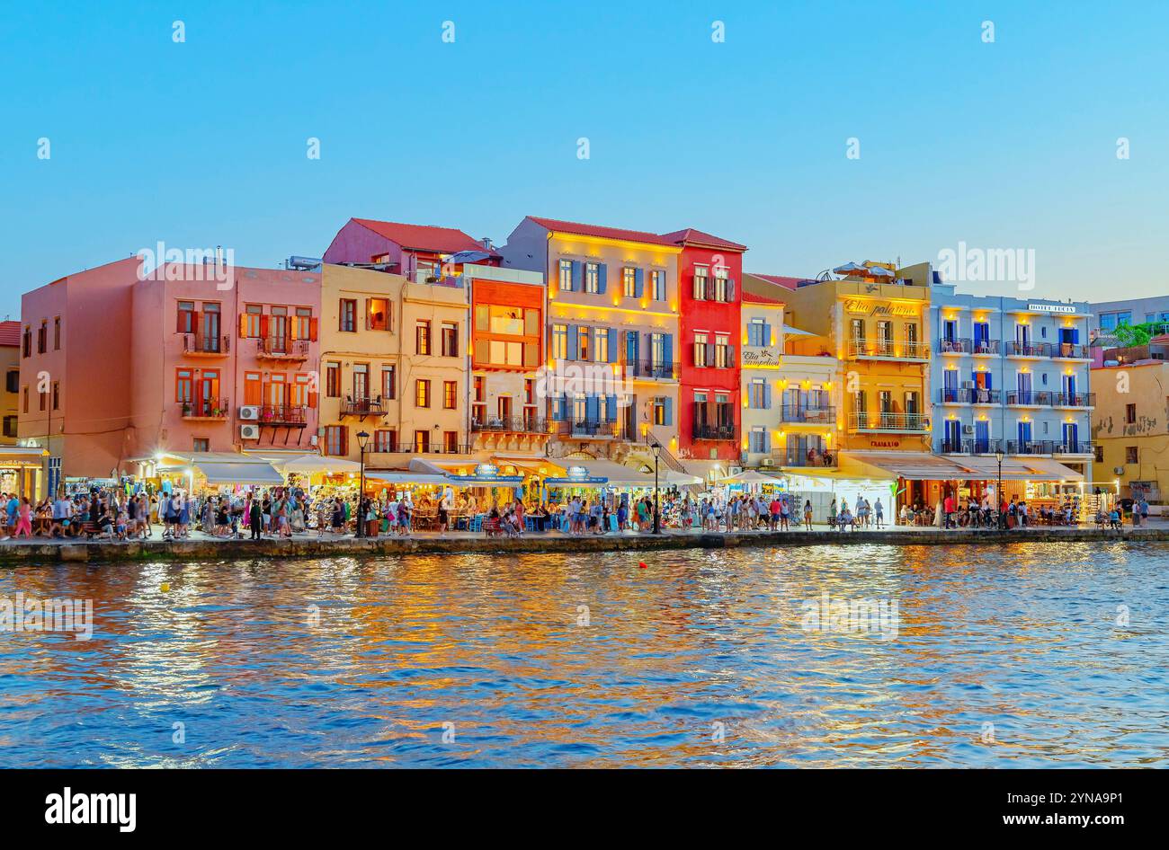 Greece, Crete, View of the old Venetian Harbour at dusk, Chania Stock ...