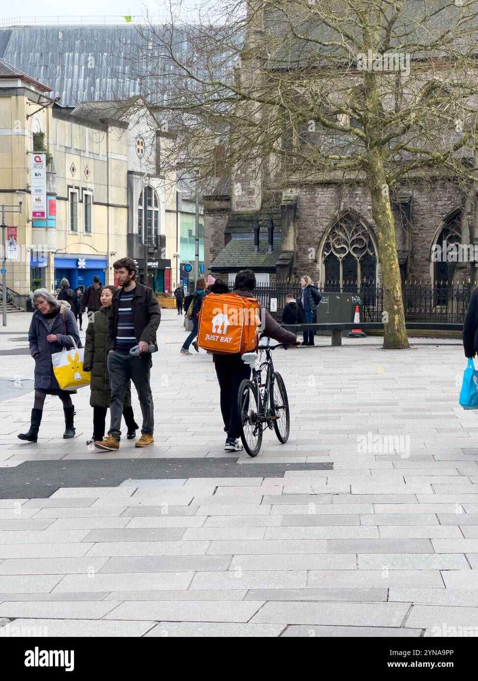 Fast food delivery couriers around central Cardiff, Wales 2023 Stock ...