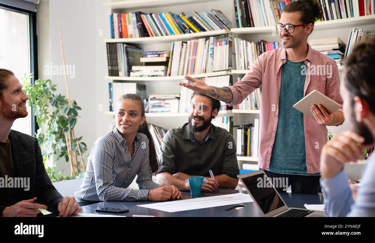 Diverse startup people on meeting having fun during brainstorming new ...