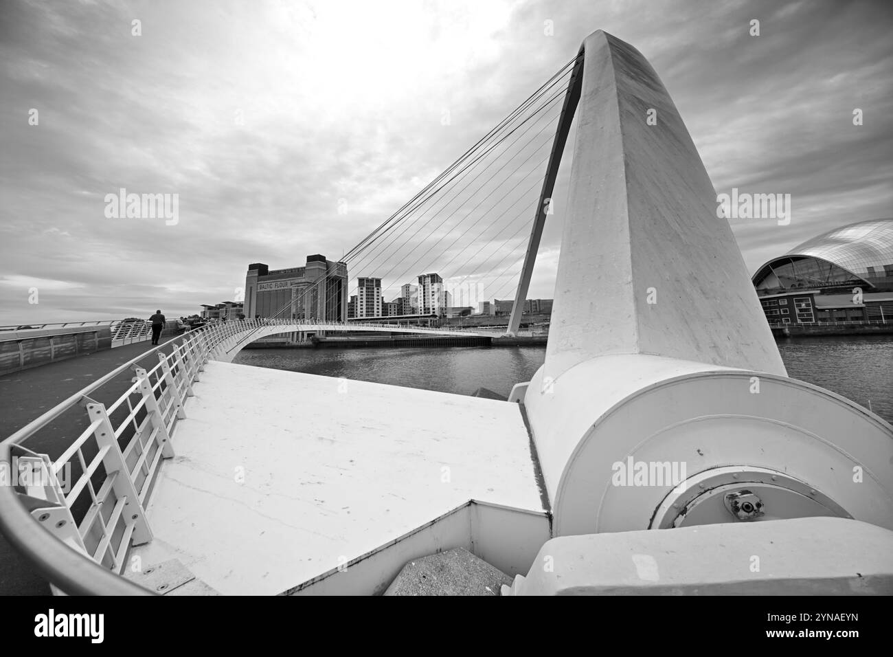 Gateshead Millenium bridge crossing over the river Tyne to Newcastle ...