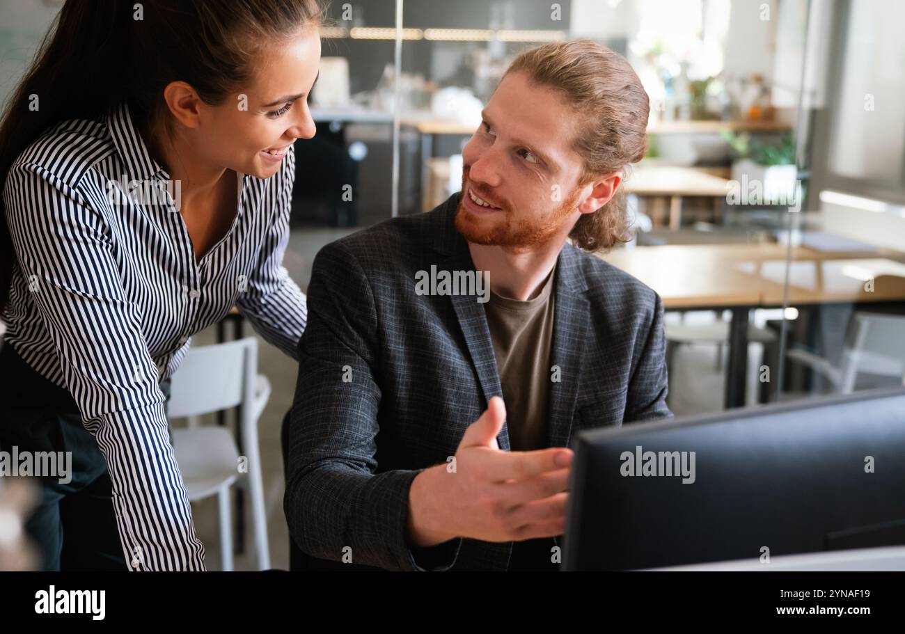 Mixed team of software engineers brainstorming ideas. Diverse app developers collaborating as ...