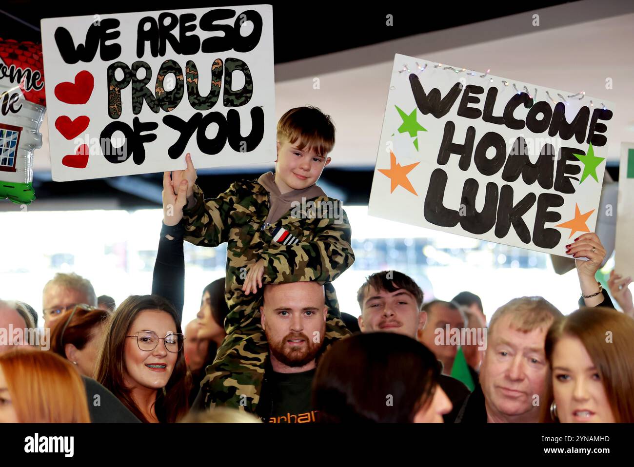 Killian Rowan, aged 7, waits for his uncle Private Luke Rowan at ...