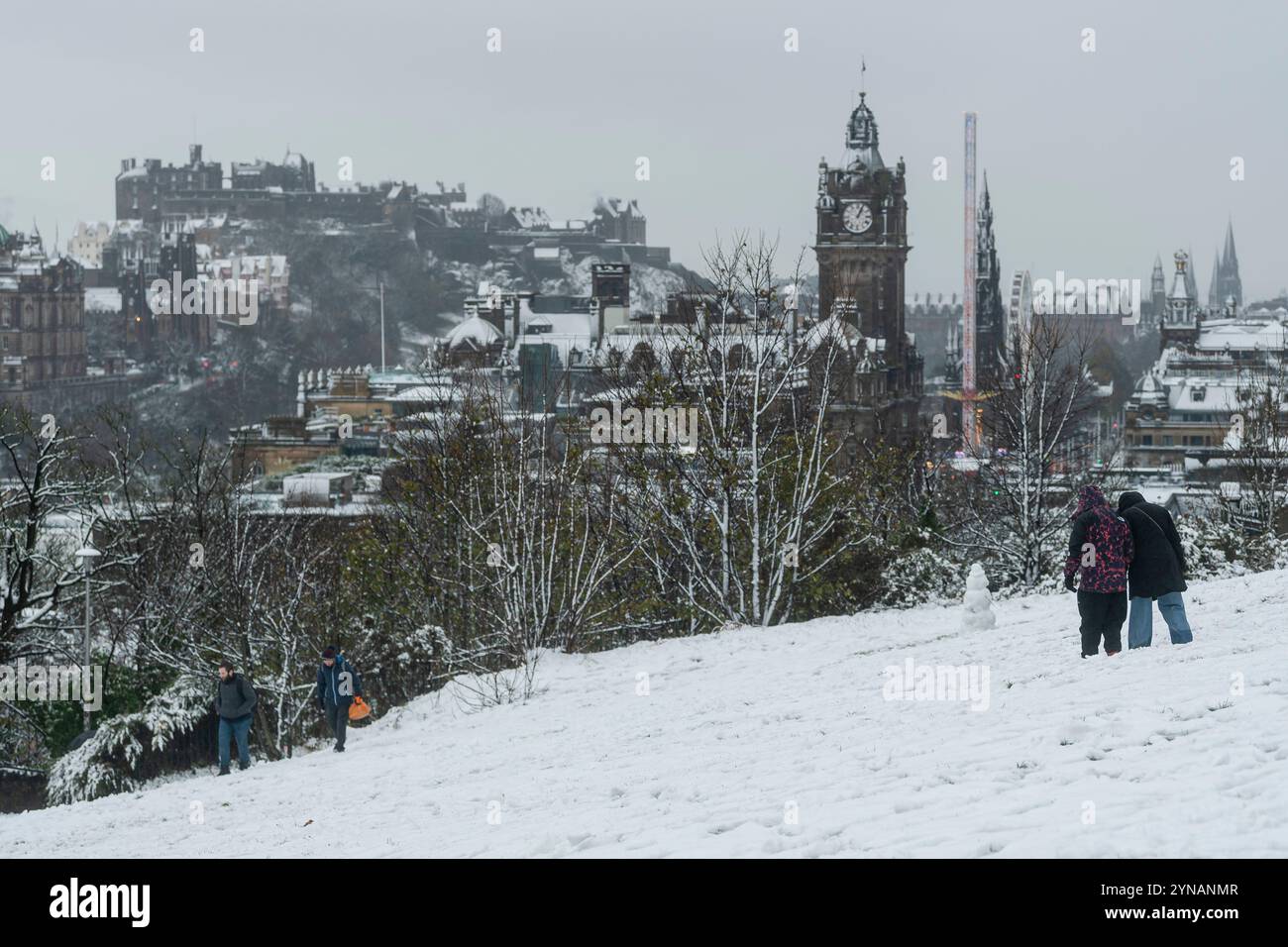 Public on the Calton Hill. Edinburgh is under a Met weather yellow ...
