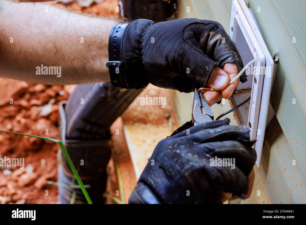Installation of electrical wires to new outlets requires precision ...