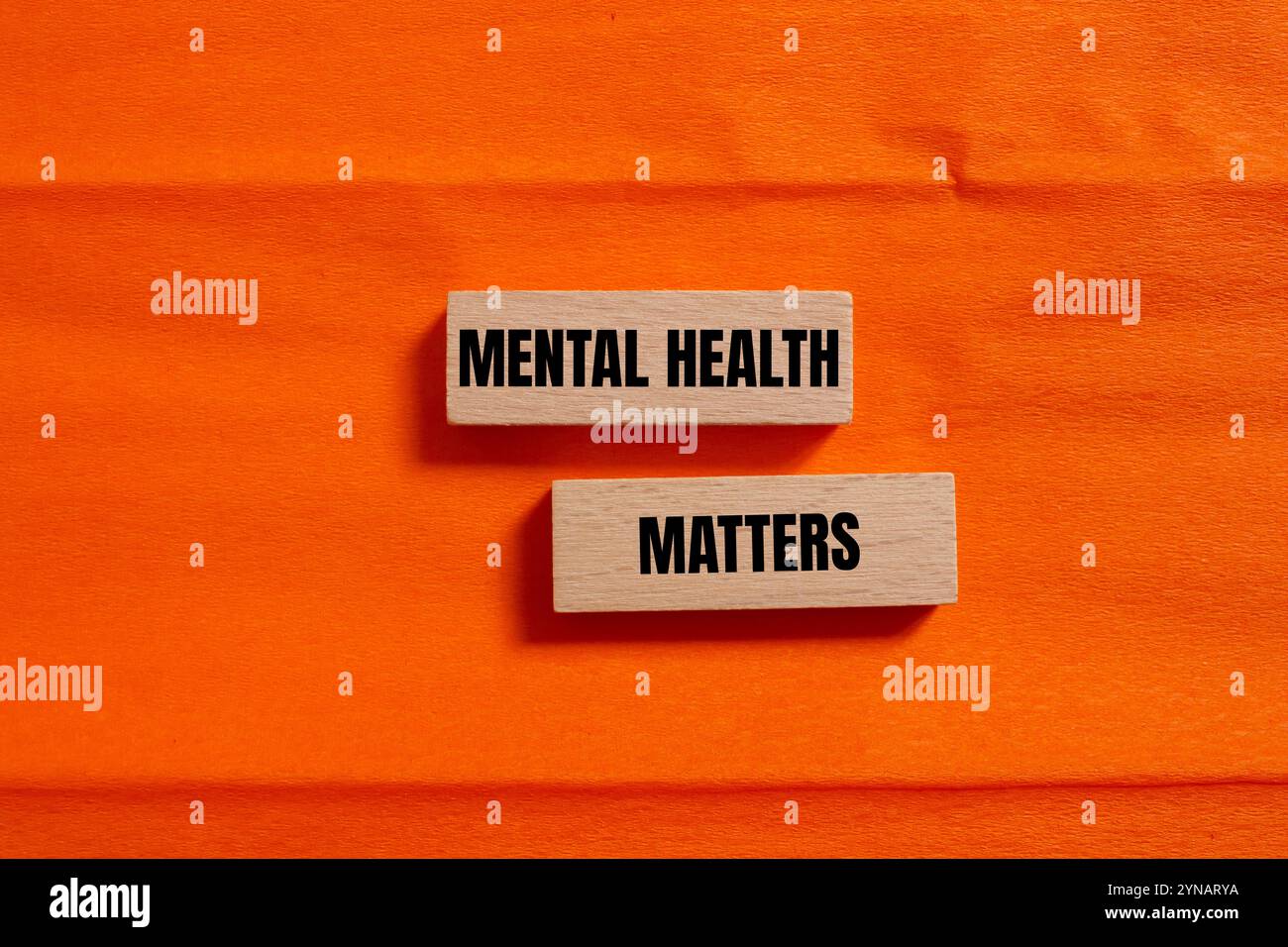 Mental health matters message written on wooden blocks with orange ...