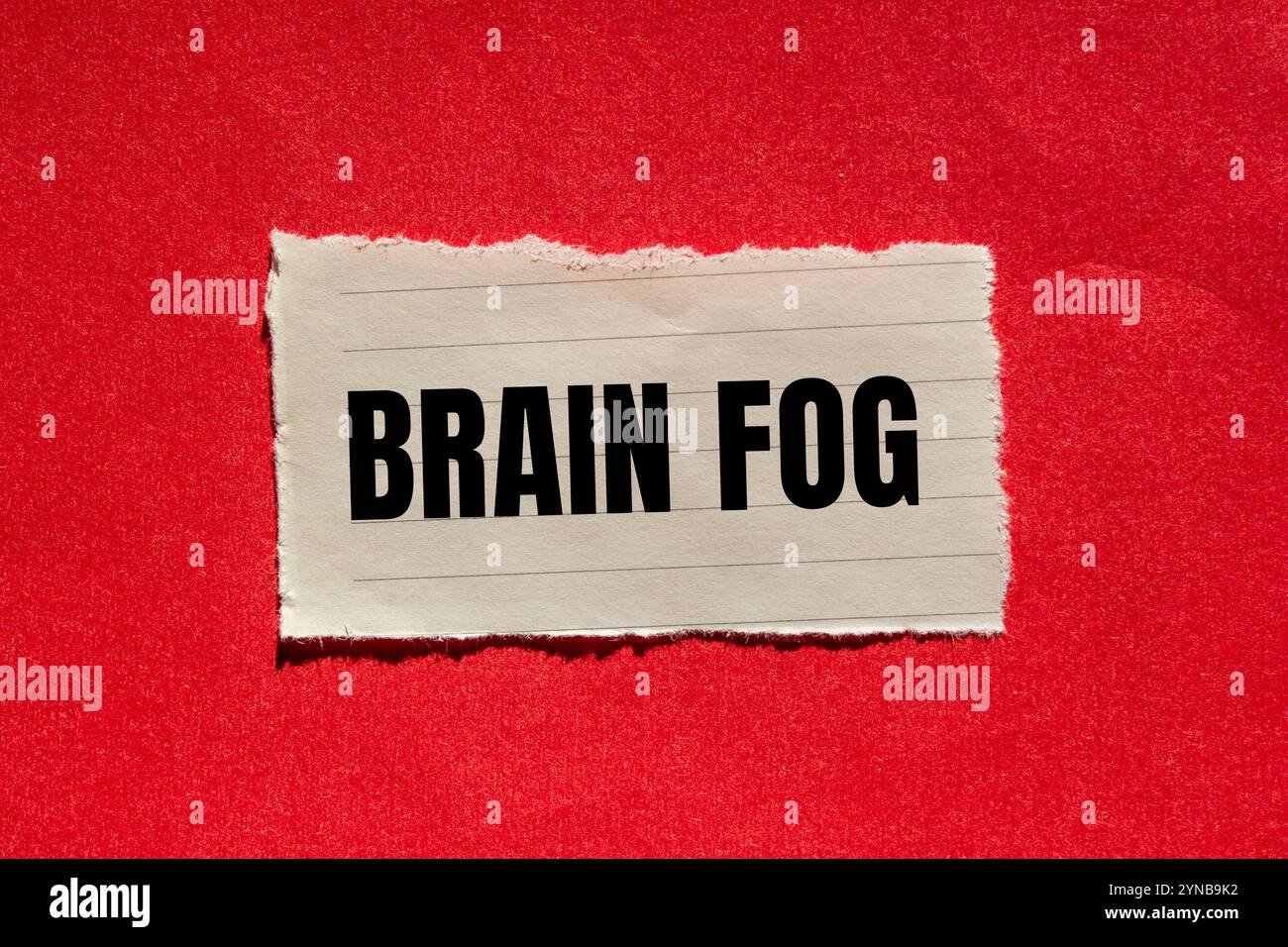 Brain fog message written on ripped torn paper piece with red ...