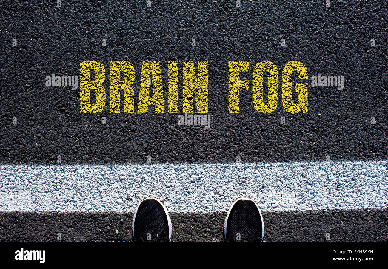 Brain fog message written on asphalt road. Conceptual brain fog symbol ...