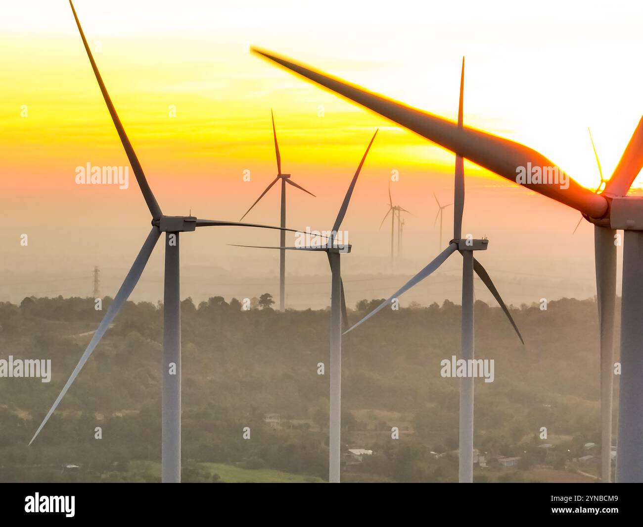 Wind farm field and sunset sky. Wind power. Sustainable, renewable ...
