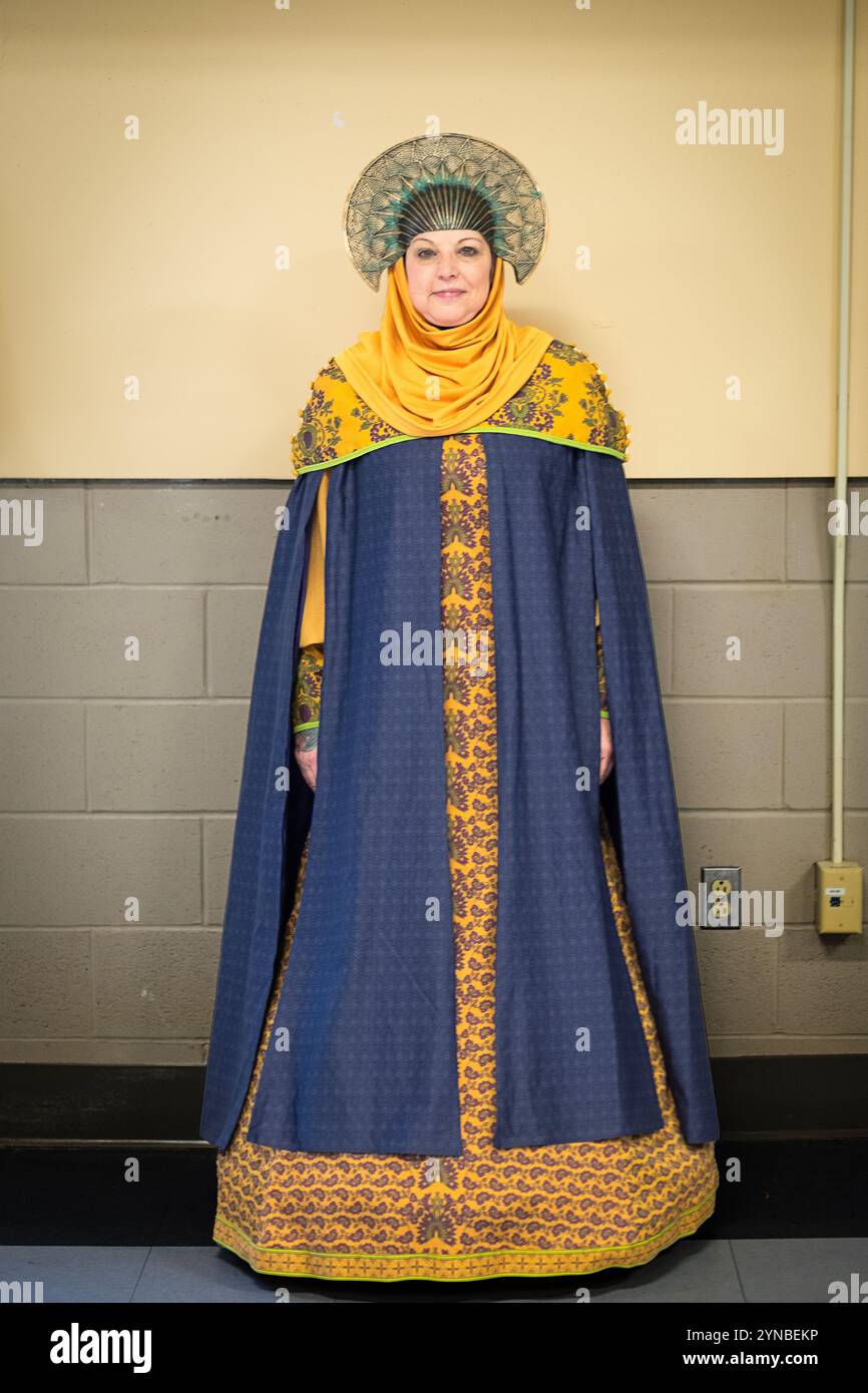 Portrait of a woman dressed as Padme Amidala of the Star Wars franchise ...