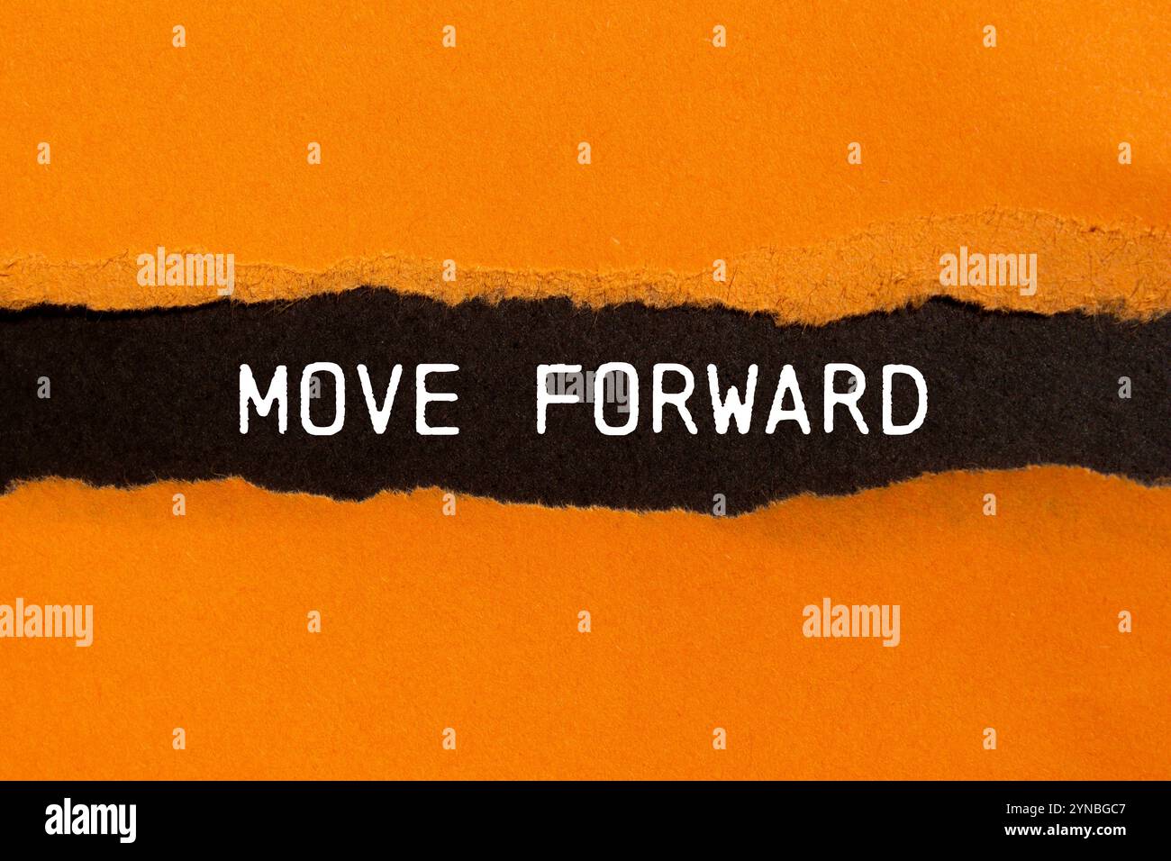 Move forward message written on ripped torn orange paper with black ...