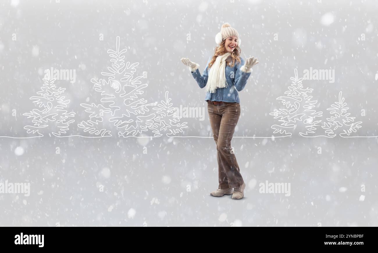 A cheerful and joyful woman embracing the beauty of a winter snowfall ...