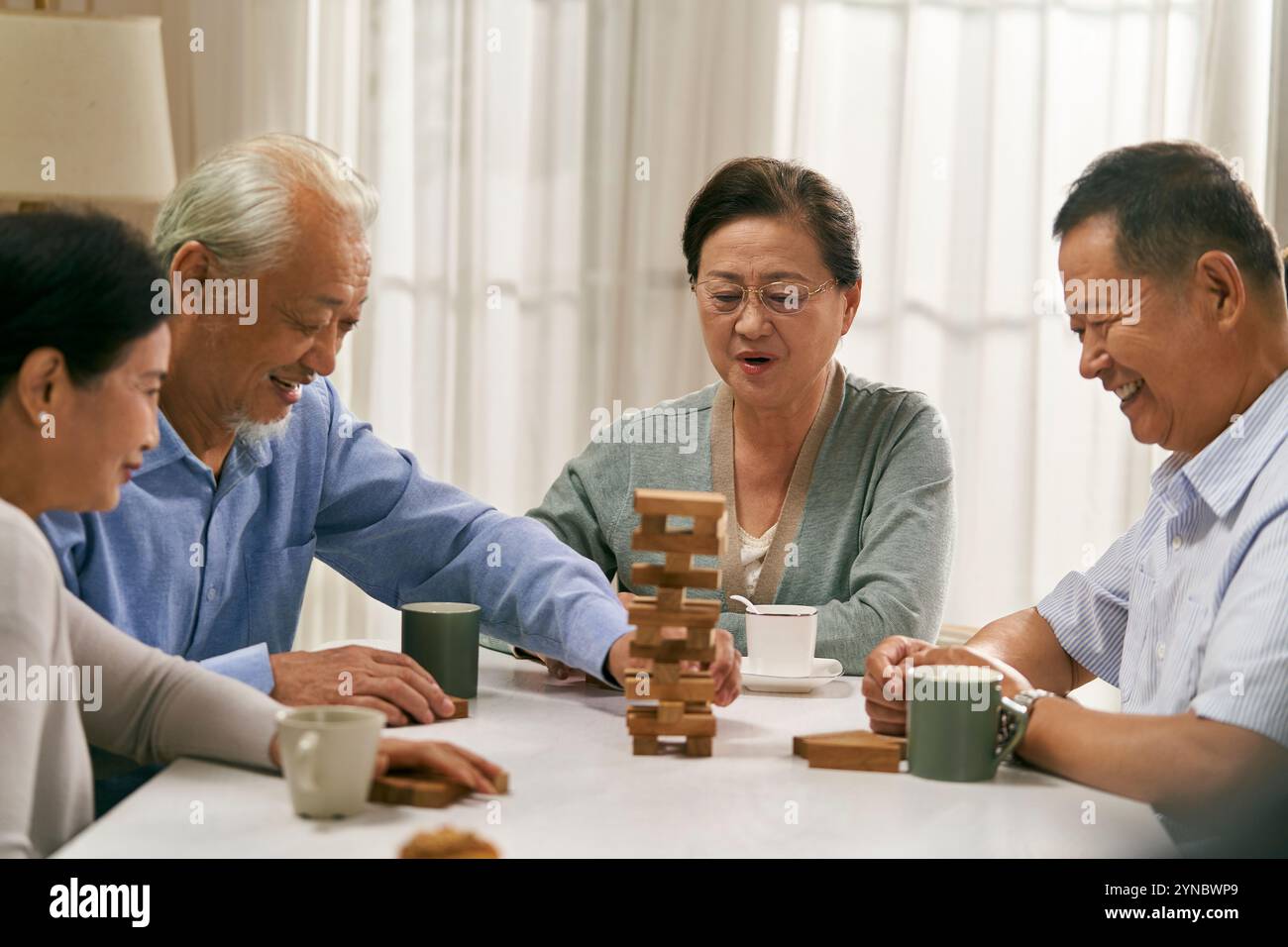 Group cheerful asian senior hi-res stock photography and images - Alamy