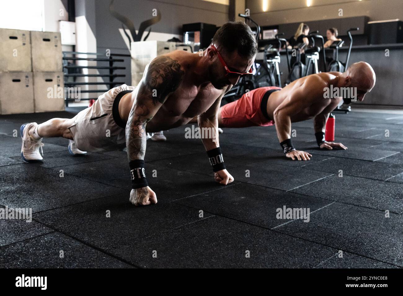 Indoor and outdoor CrossFit Training, female and male bodybuilder Stock ...