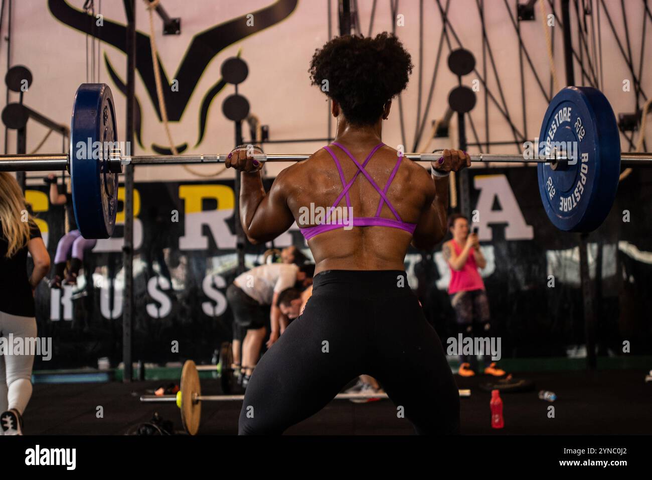 Indoor and outdoor CrossFit Training, female and male bodybuilder Stock ...