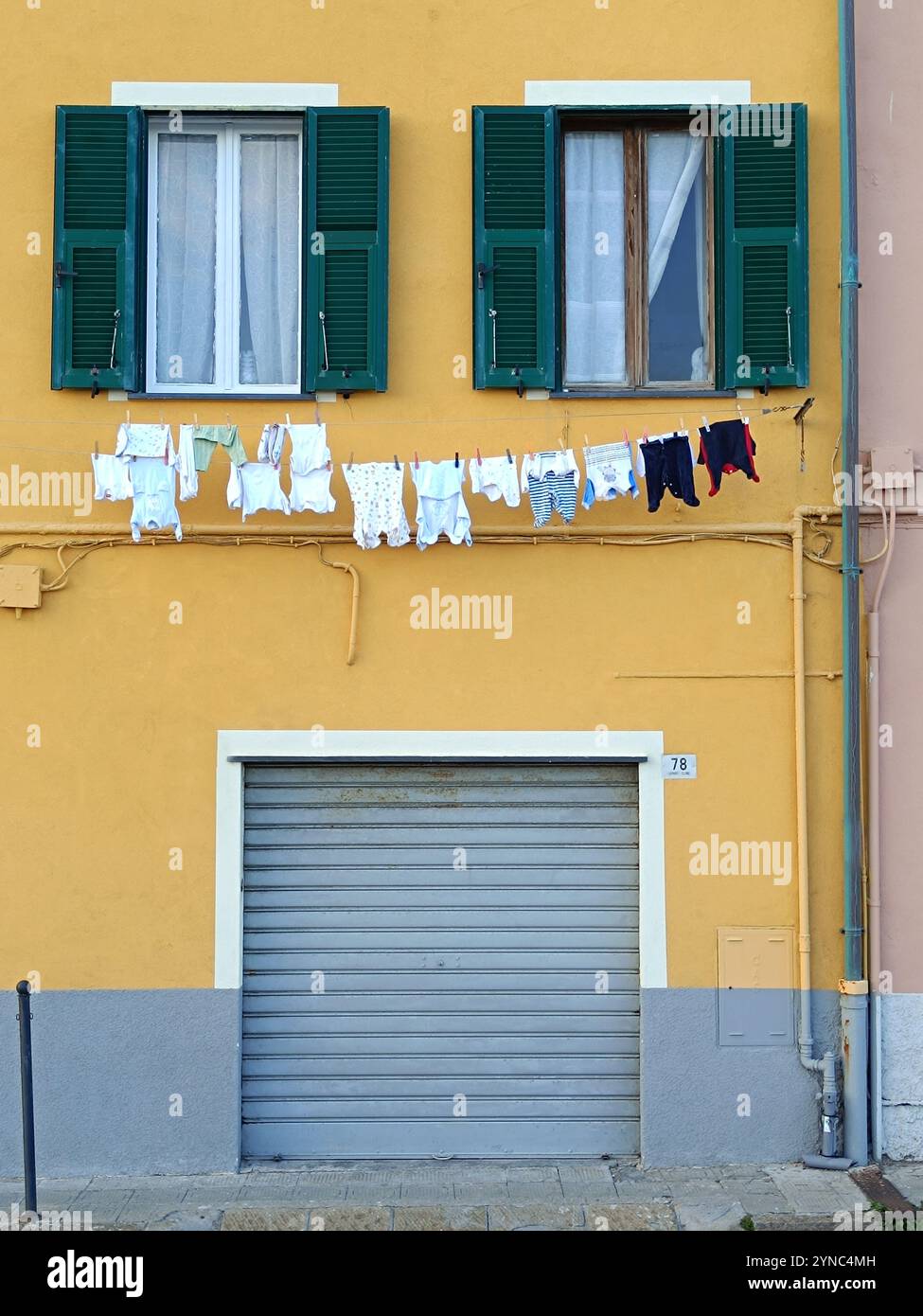 Drying baby clothes hi-res stock photography and images - Alamy