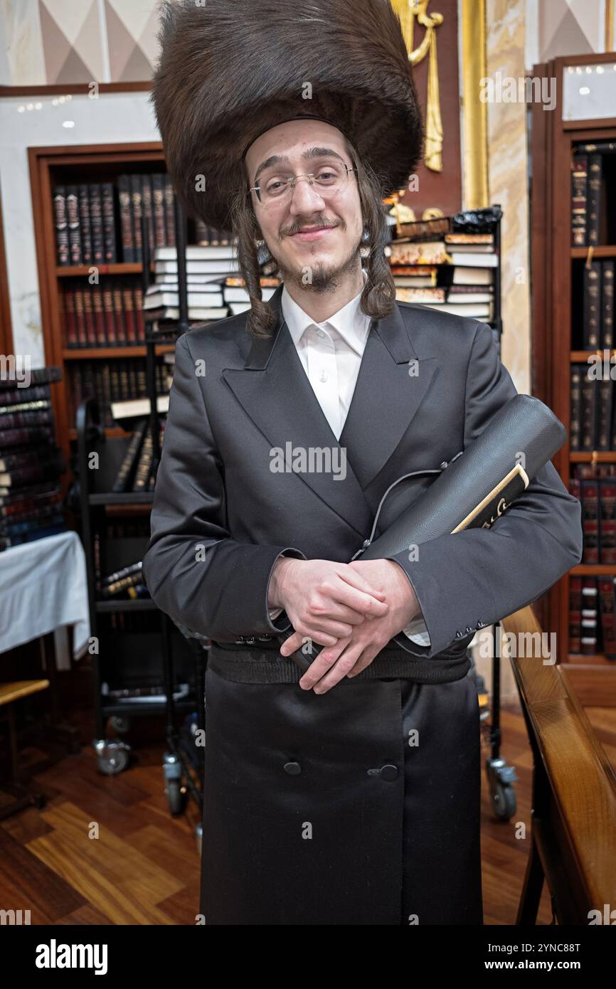 posed photo of an orthodox Jewish man wearing a streimel fur hat ...