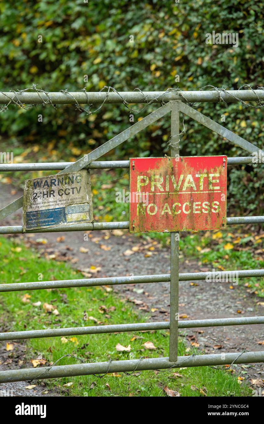 private sign and no access sign with warning for CCTV cameras sign on a ...