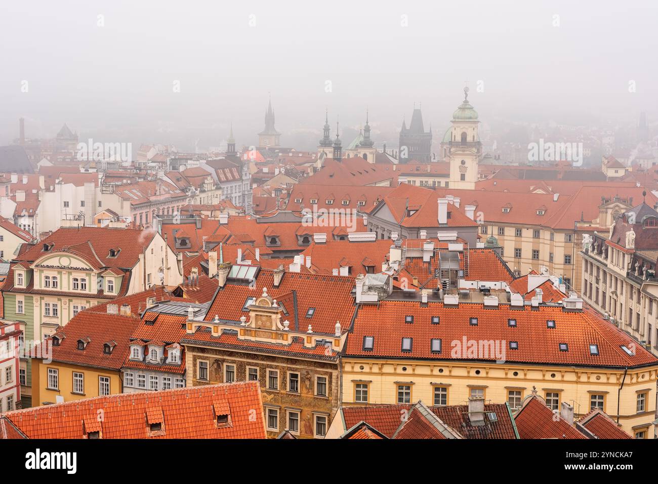 Medieval buildings and towers rising in an aerial view of the city of ...
