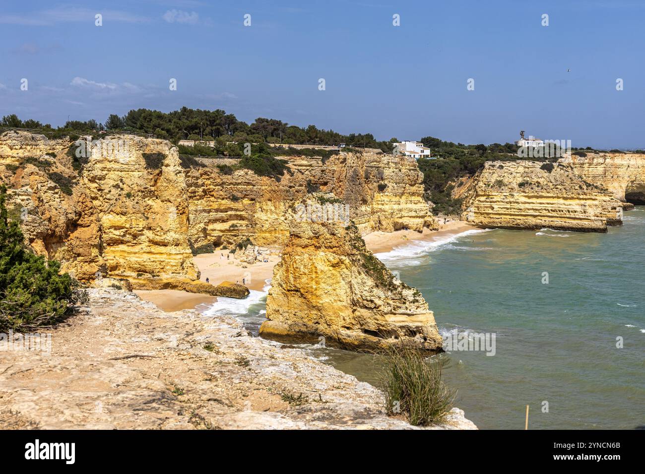 Praia da Marinha Beach among rock islets and cliffs seen from Seven ...