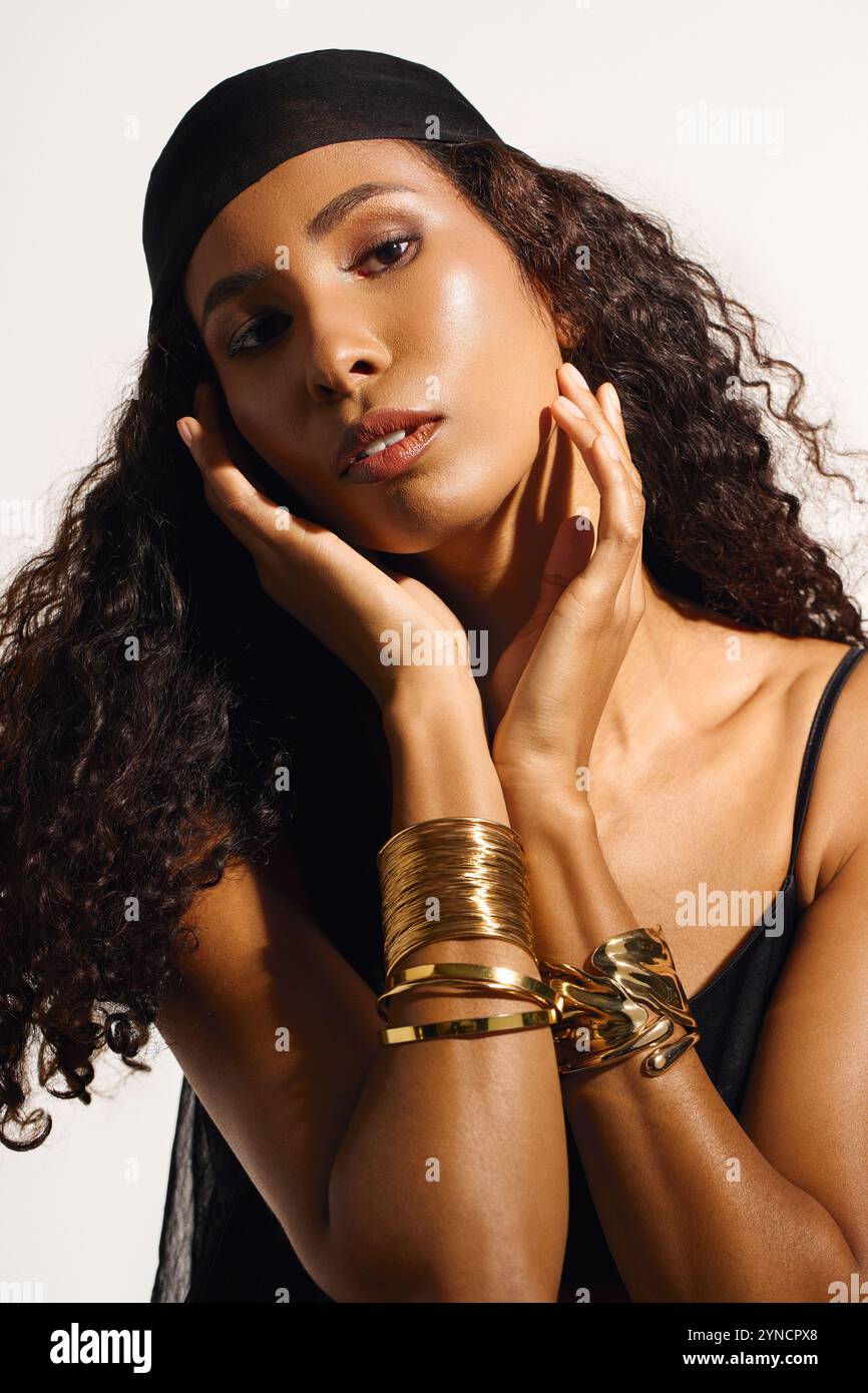 Elegant woman poses gracefully, featuring subtle expression and ...