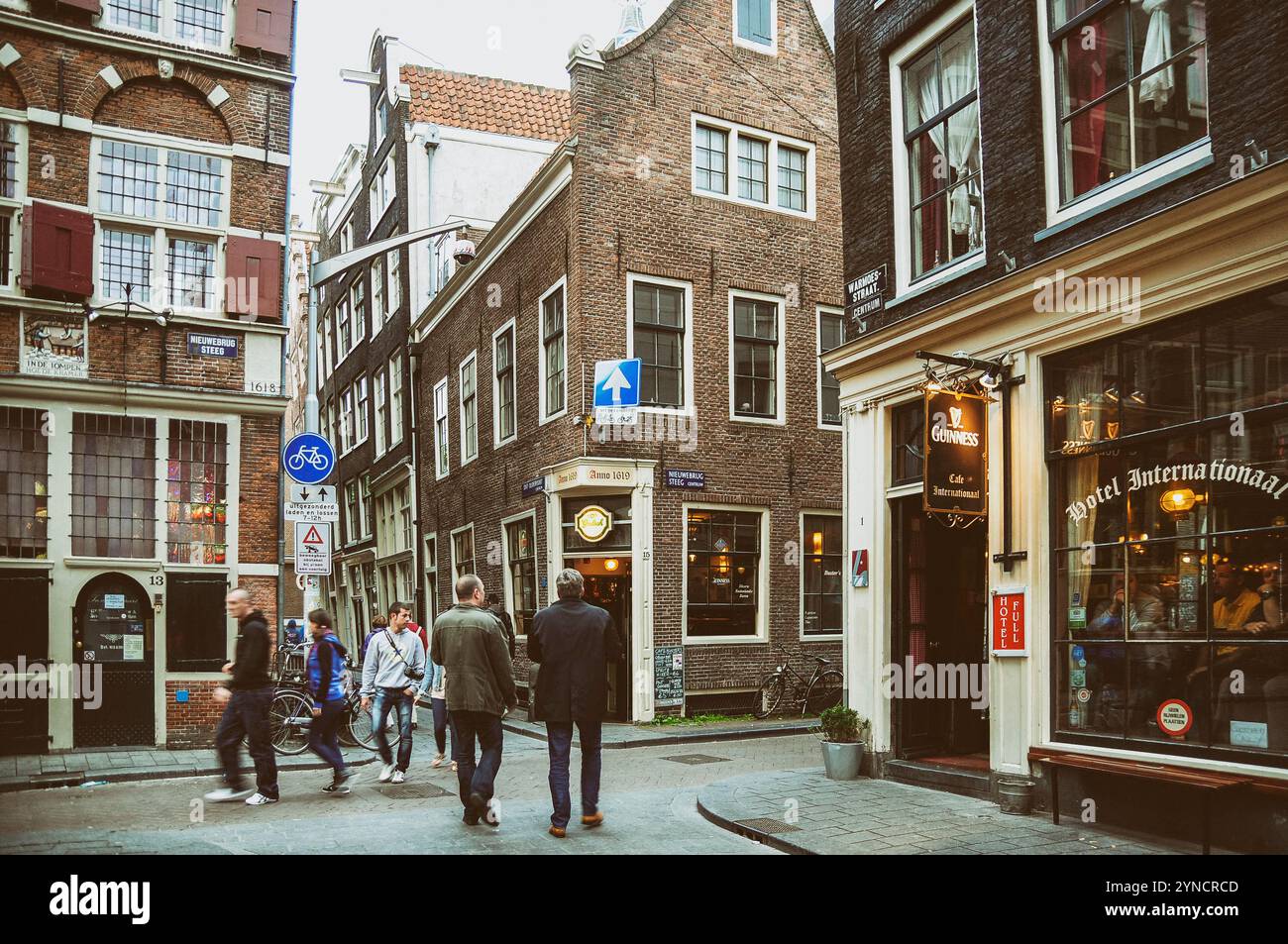 People walking at Zeedijk,a street in the old centre of Amsterdam. The street is the northern ...