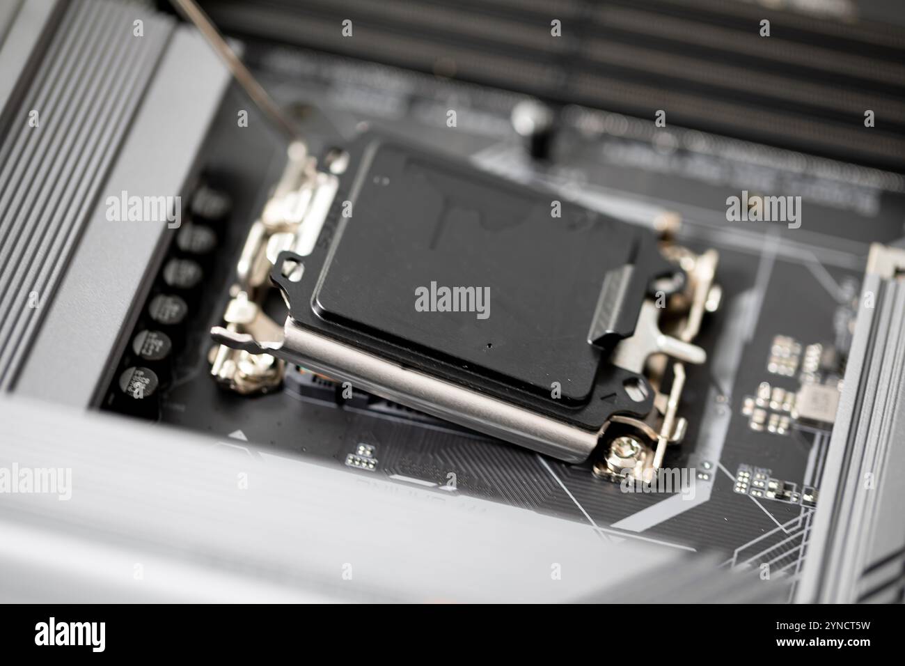Detailed closeup view of a CPU socket located on an advanced motherboard component Stock Photo ...