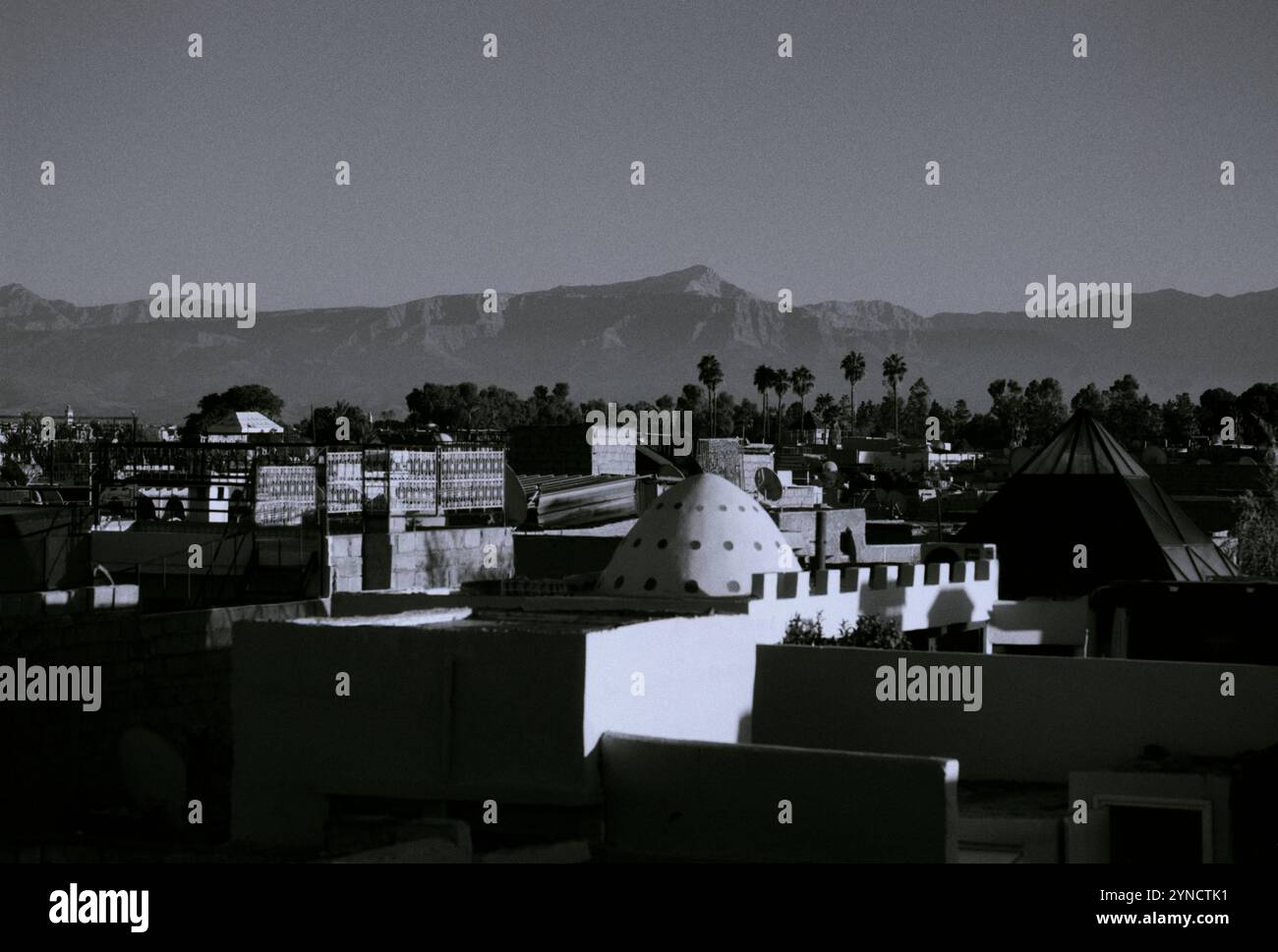 A cityscape view to the Atlas Mountains in the ancient old city of ...
