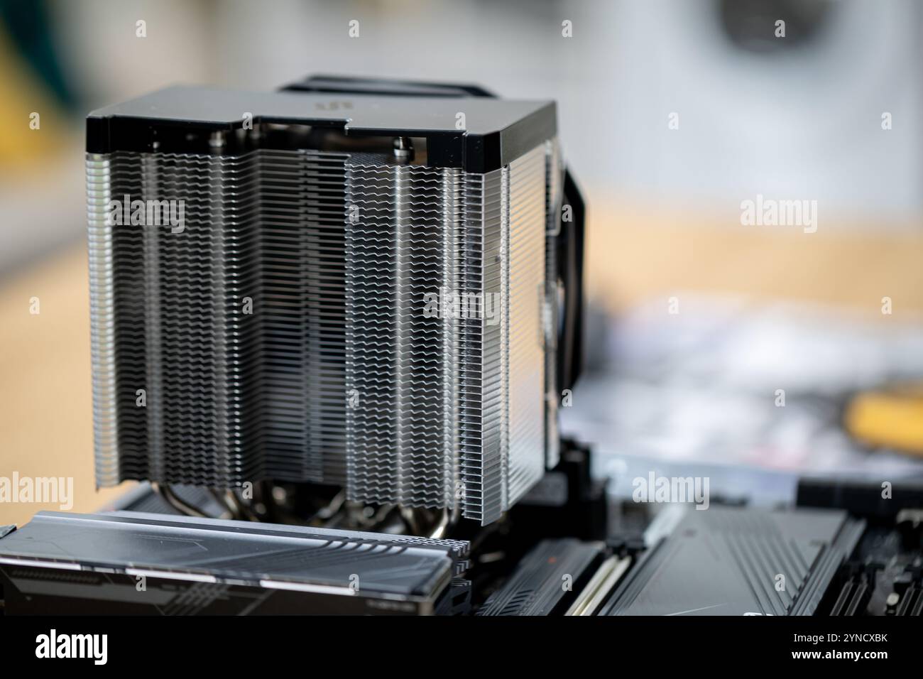 This is an advanced, highperformance CPU cooler mounted securely on the ...