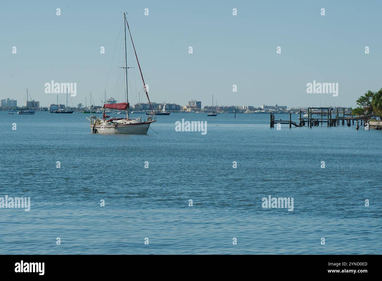 Small boat sails across clear hi-res stock photography and images - Alamy