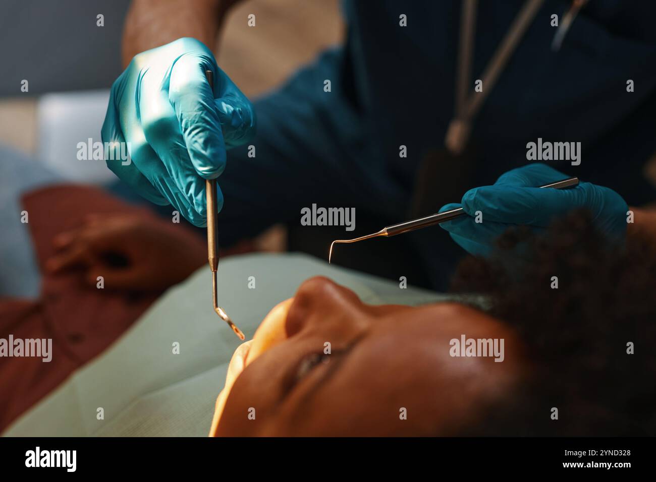 Inspecting Patient Mouth with Dental Instruments Stock Photo - Alamy