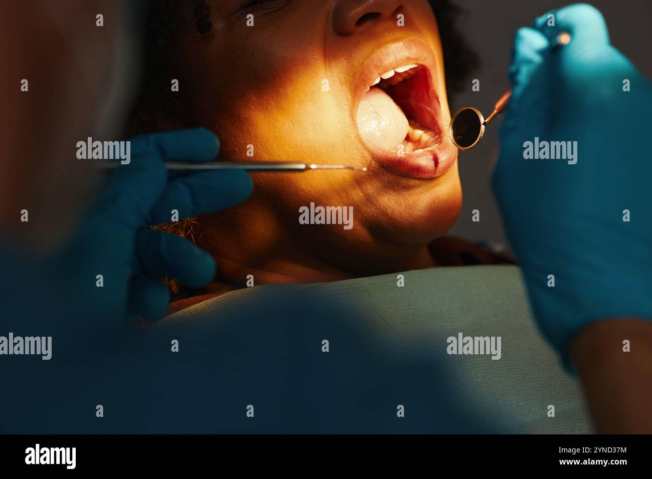 Inspecting Oral Health in a Dental Clinic Environment Stock Photo - Alamy