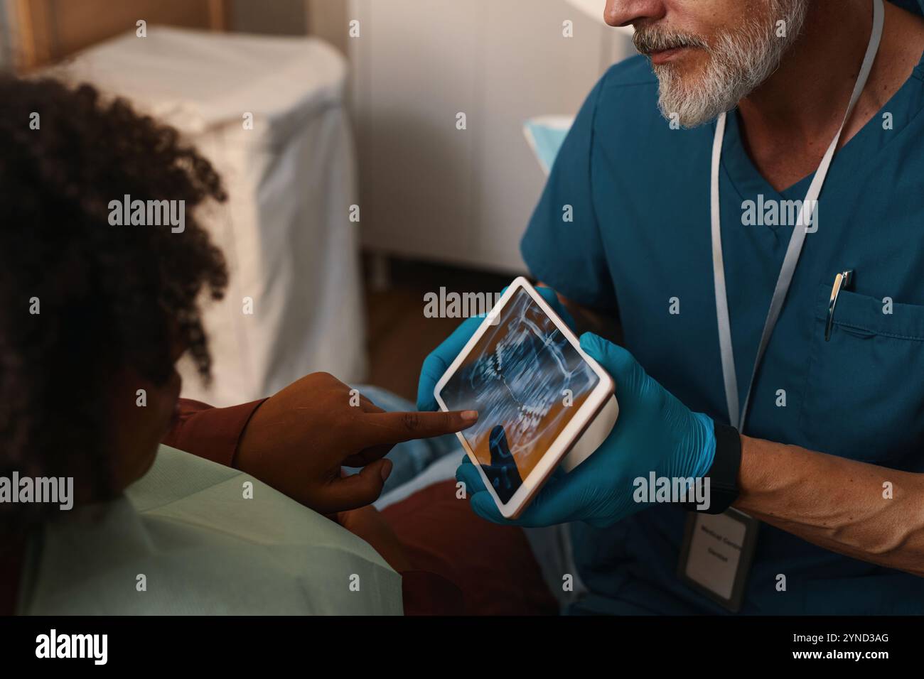 Doctor showing tablet medical report hi-res stock photography and ...