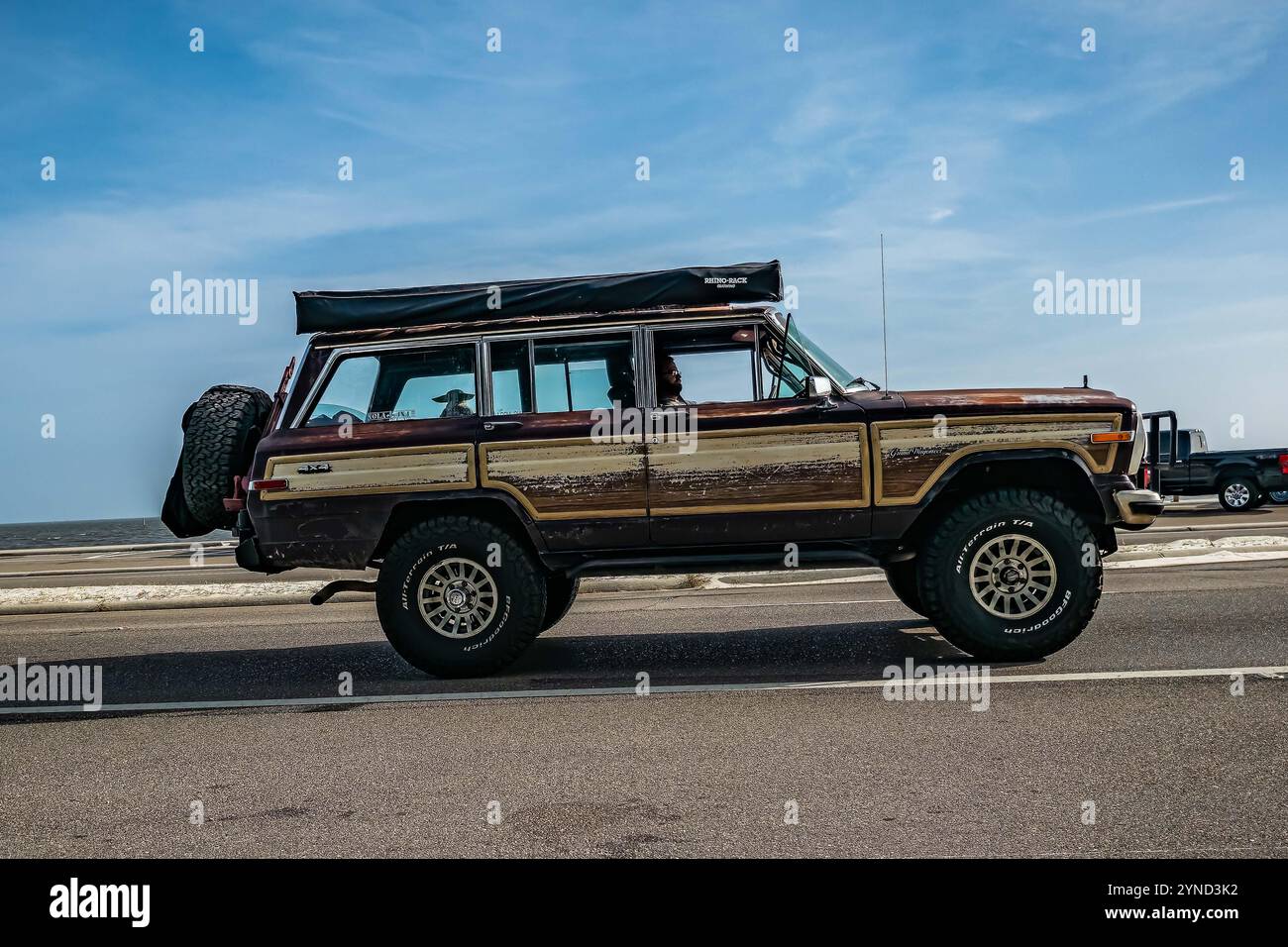Gulfport, MS - October 04, 2023: Wide angle side view of a 1988 Jeep ...