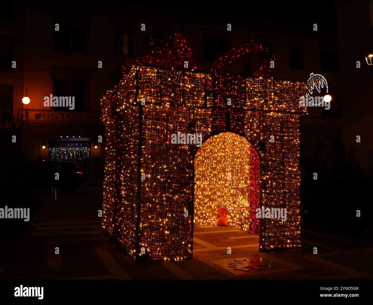 A Christmas Present wrapped in lights and colors in the city centre of ...
