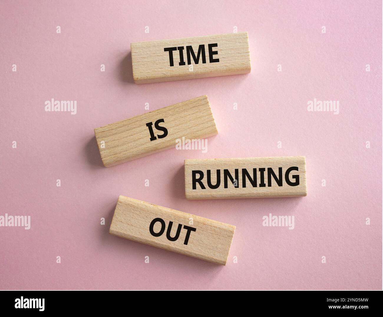 Time is running out symbol. Concept words Time is running out on wooden ...