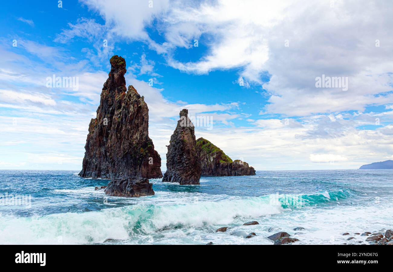 Tall lava rocks in ocean, islet towers in Ribeira da Janela, Madeira ...