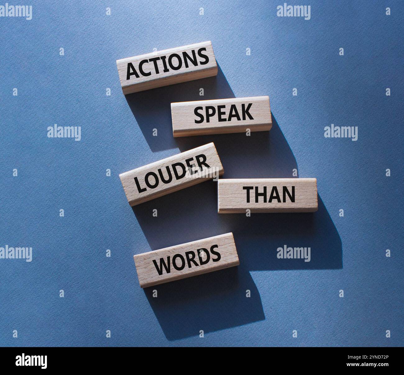 Actions speak louder than Words symbol. Wooden blocks with words ...