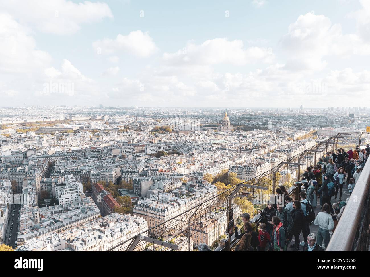 Tourists on the observation deck at the top of the Eiffel Tower. Paris ...