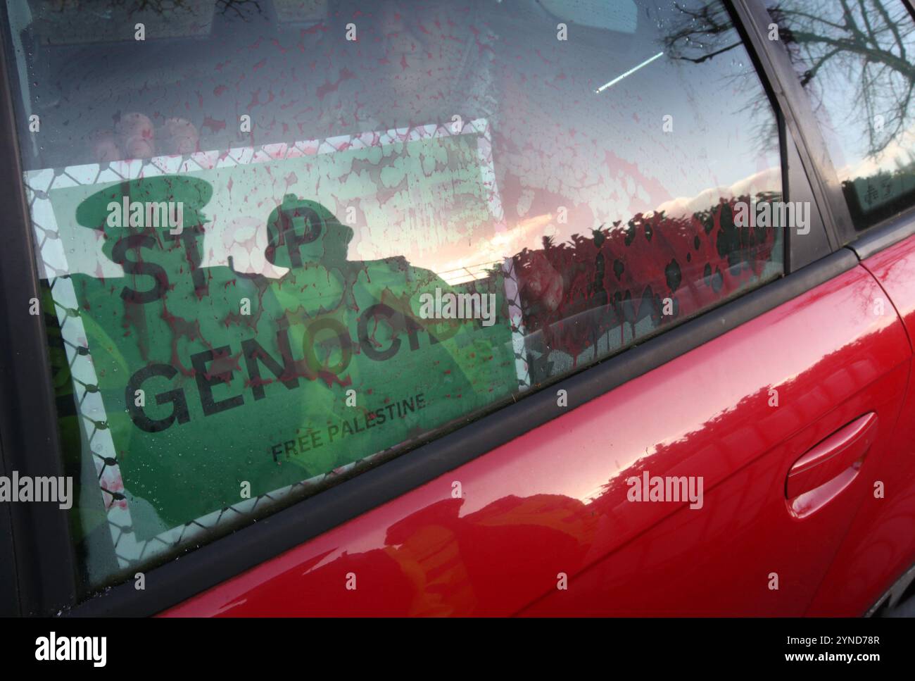 November 25, 2024, Shenstone, England, UK: The reflection of two police ...