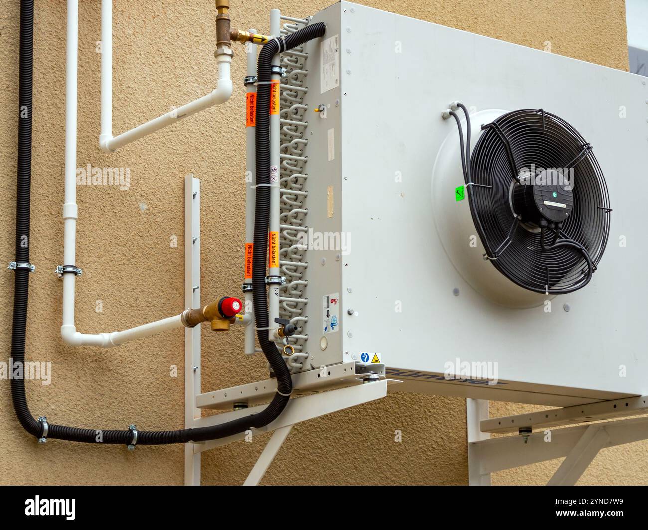 Russia, Kislovodsk - December 05, 2023: Connecting the outdoor unit of ...