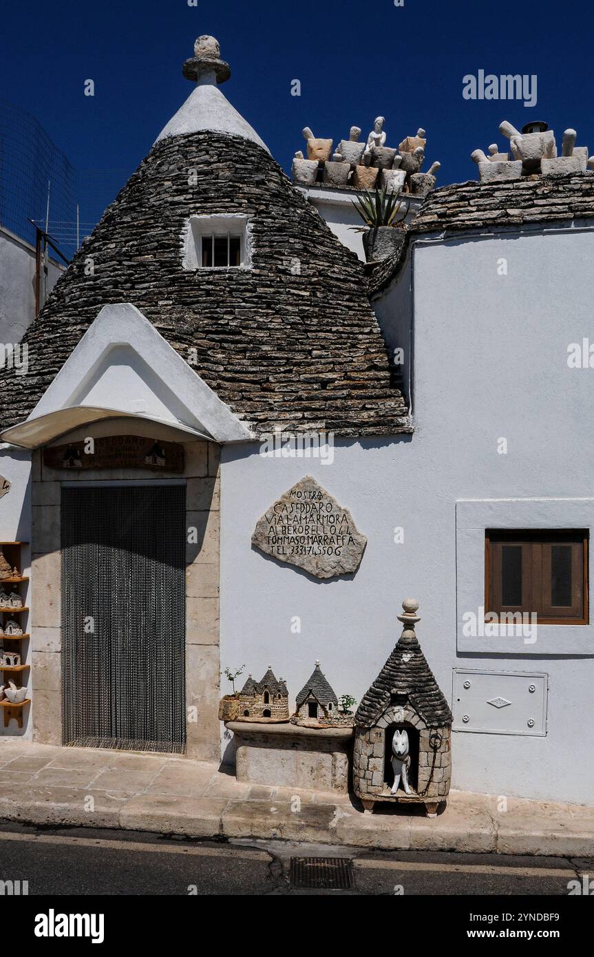 Restored trullo, a traditional single-storey building with whitewashed ...