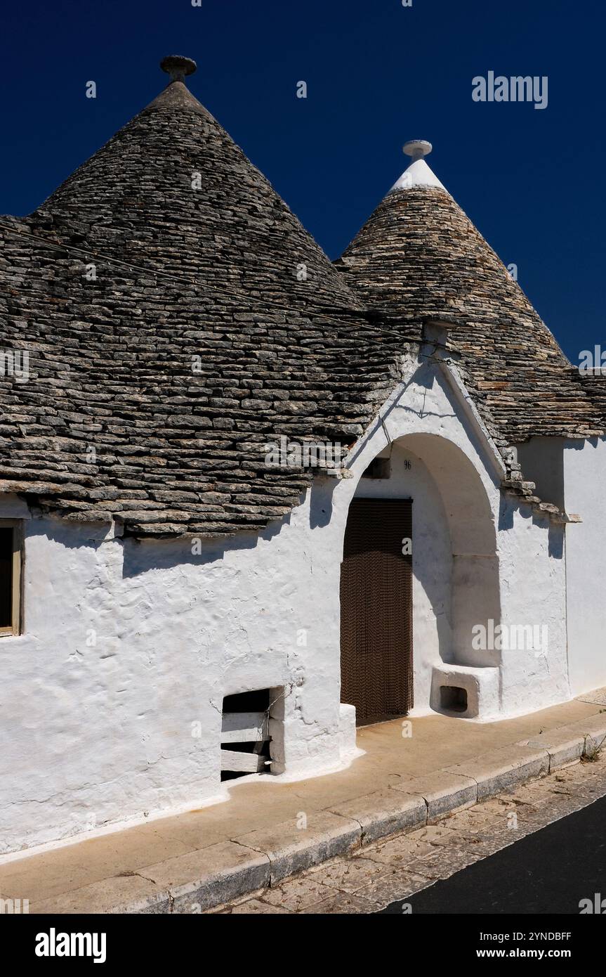 Double-coned trullo with gabled entrance in Alberobello in Puglia ...