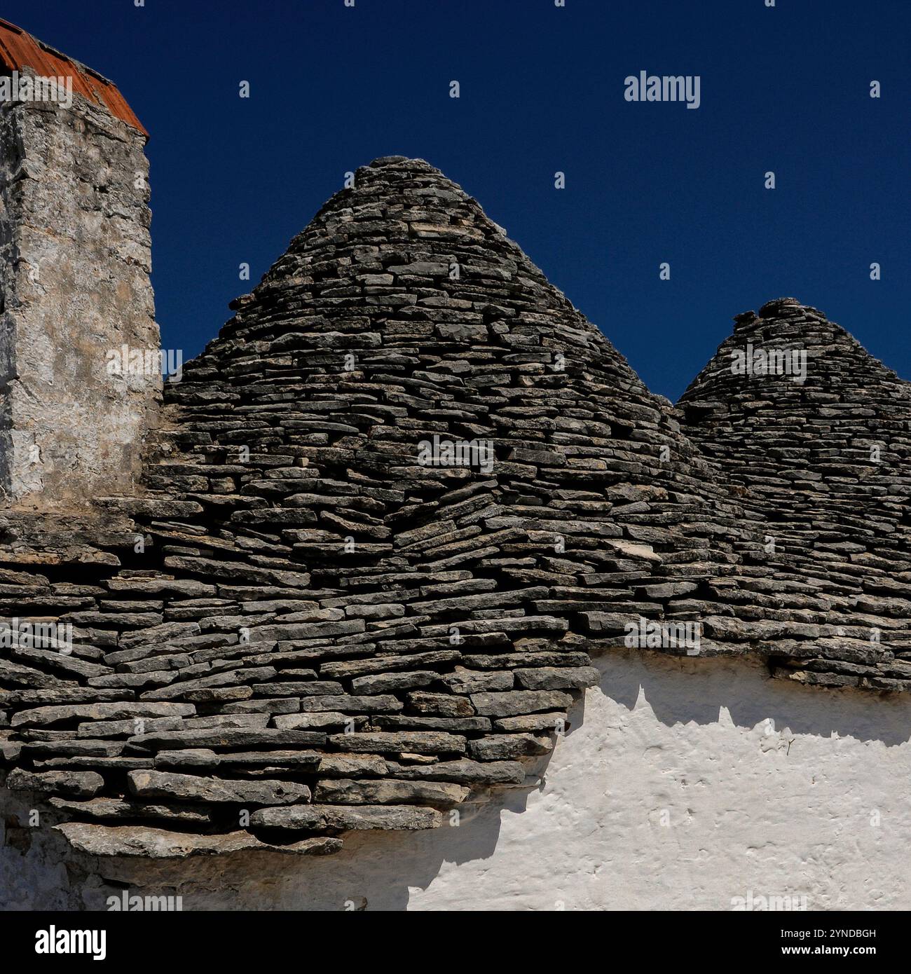 Roof cones on restored trullo in Alberobello, Puglia, Italy. Trullo ...