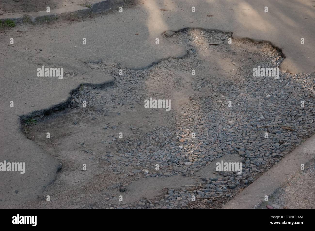 abandoned bad road: broken asphalt Stock Photo - Alamy