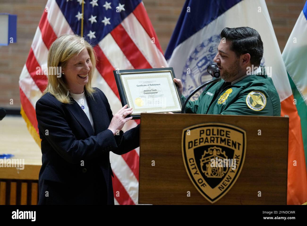 New NYPD Commissioner Jessica Tisch, left, receives a retirement ...
